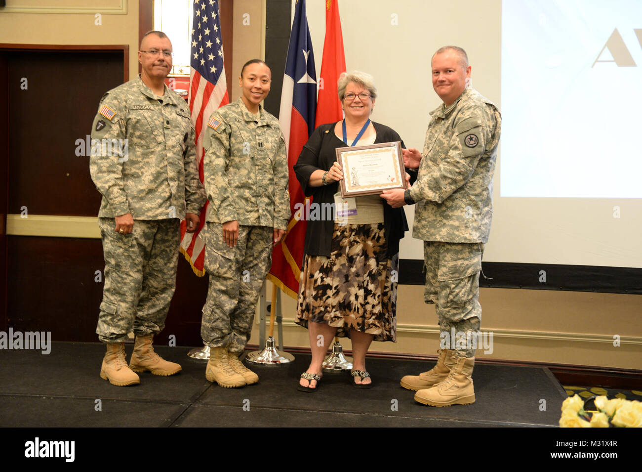 Volunteers receive awards for their volunteer service to the Texas ...