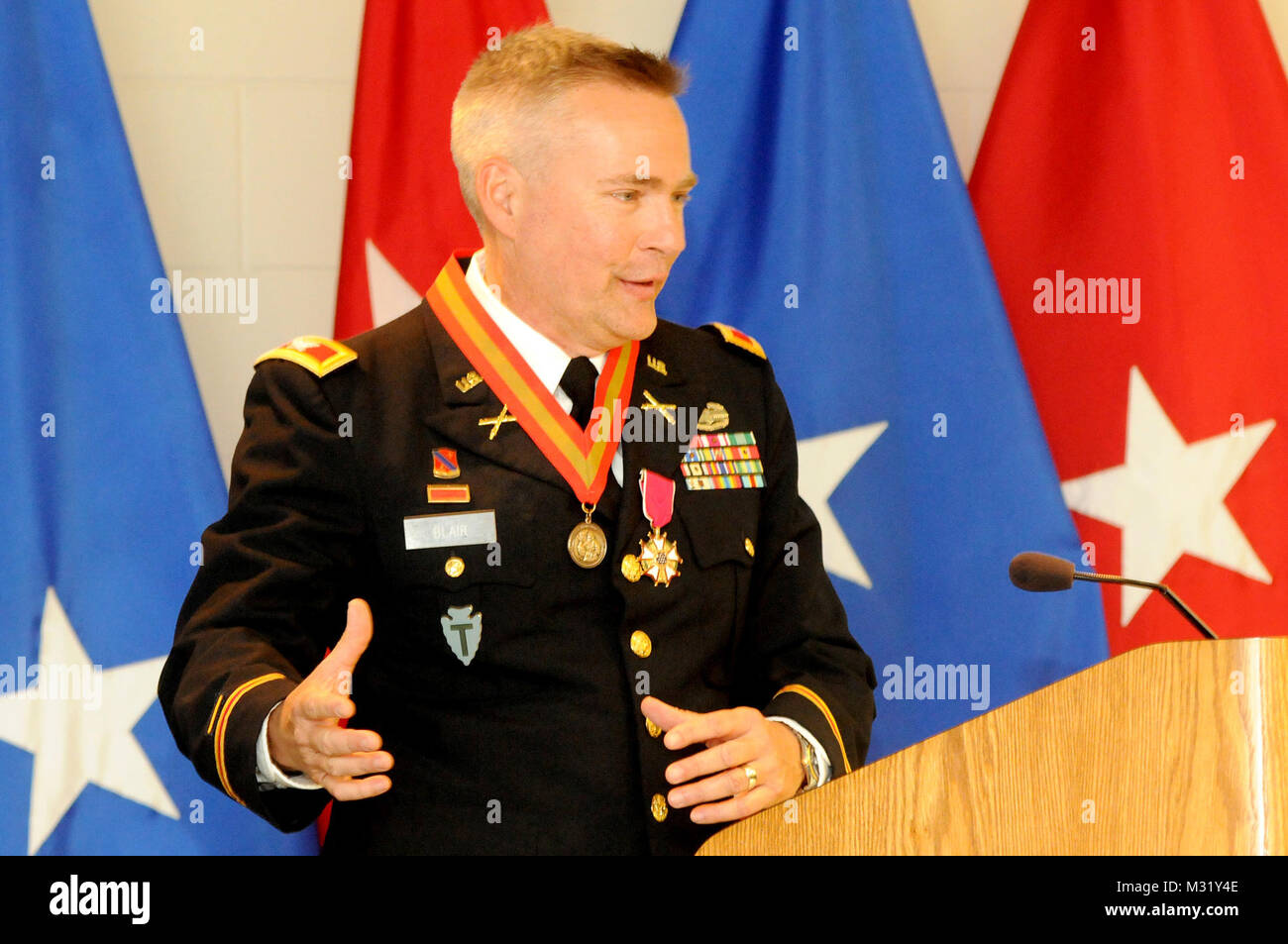Col. Rick Blair takes a moment to thank friends and family and ...