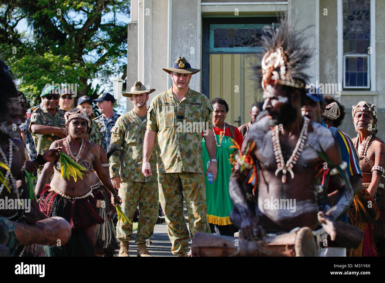 Residents of Wewak welcome Air Commodore Ken Quinn and Colonel Dick ...