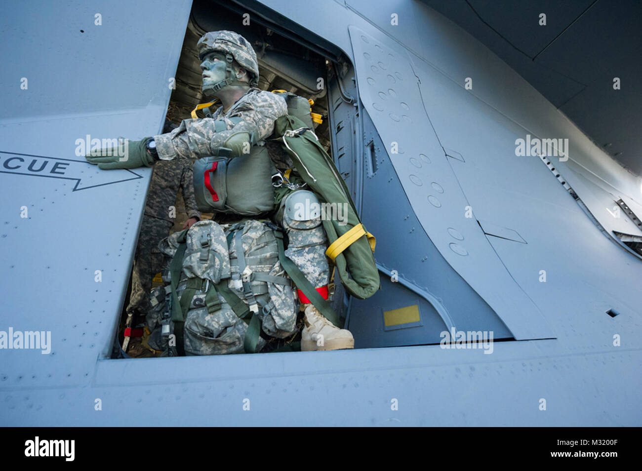 Army Staff Sgt. Benjamin Nenno, assistant jumpmaster assigned to B Co ...