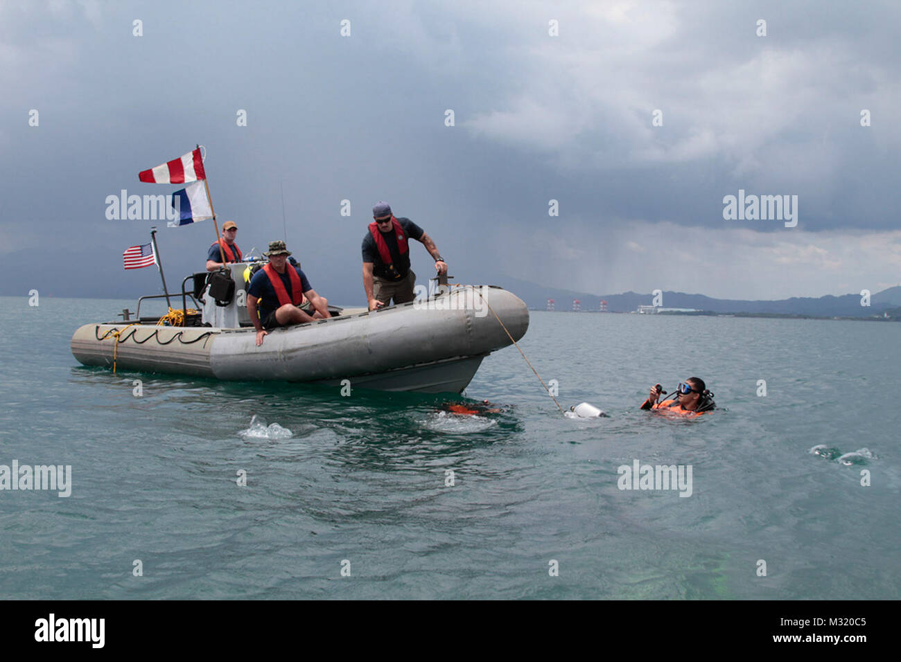 Conducts a diving evolution with Philippines Coast Guard divers by #PACOM Stock Photo - Alamy