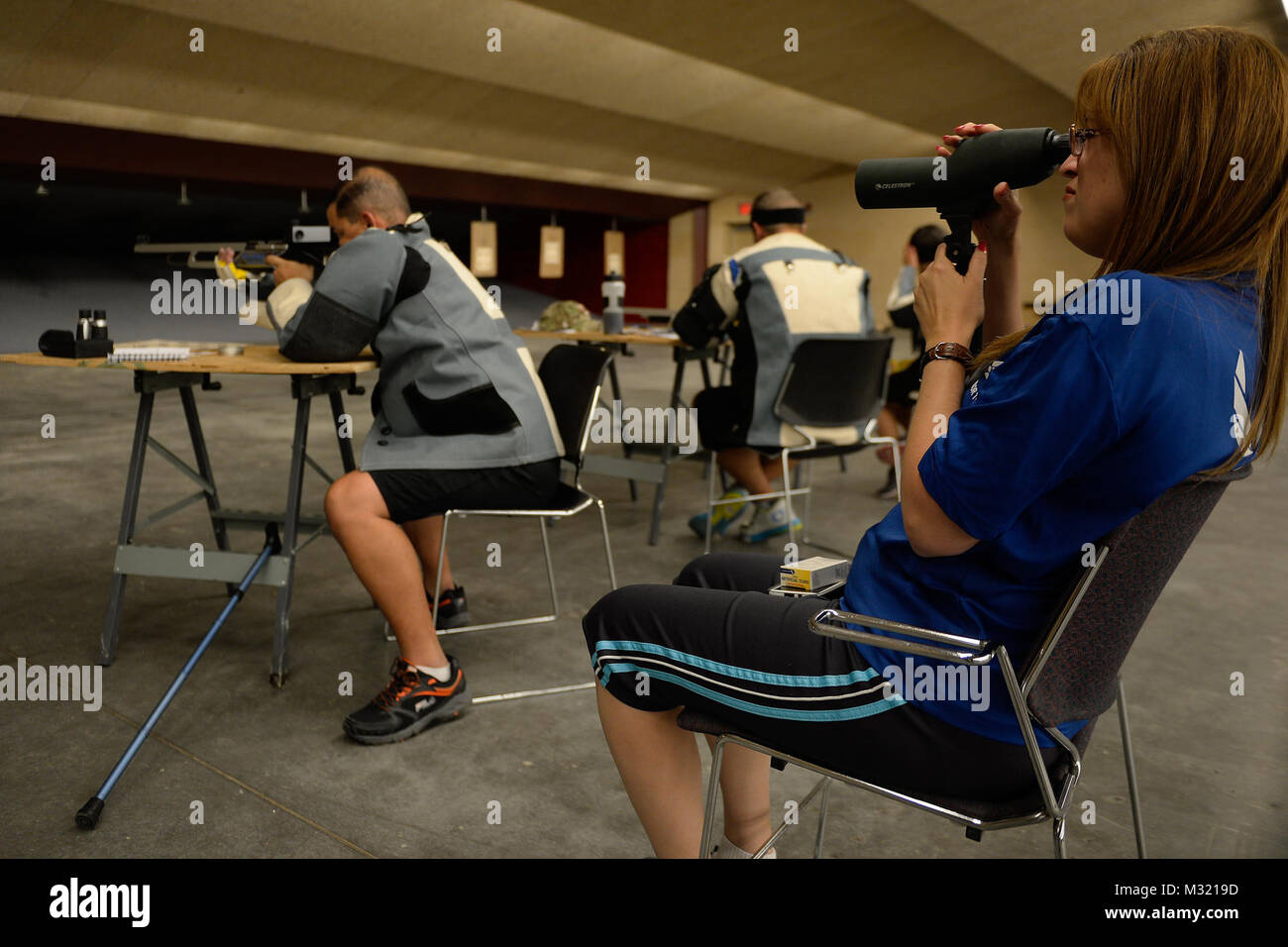 Alex Gaud-Torress watches her husband Axel, Wounded Warrior athlete ...