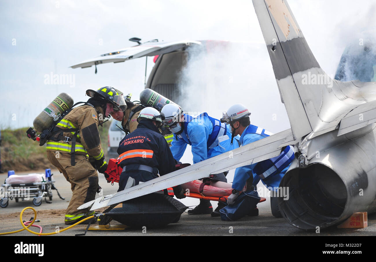 Firefighters from Misawa Air Base, alongside emergency personnel from ...