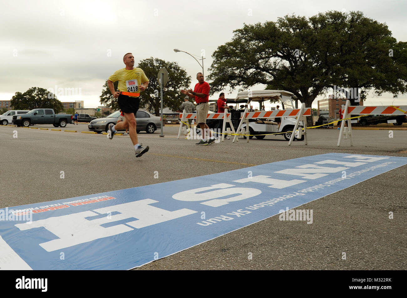 Lt. Col. Darrel Debish, Deputy G1, Texas Army National Guard, crosses ...