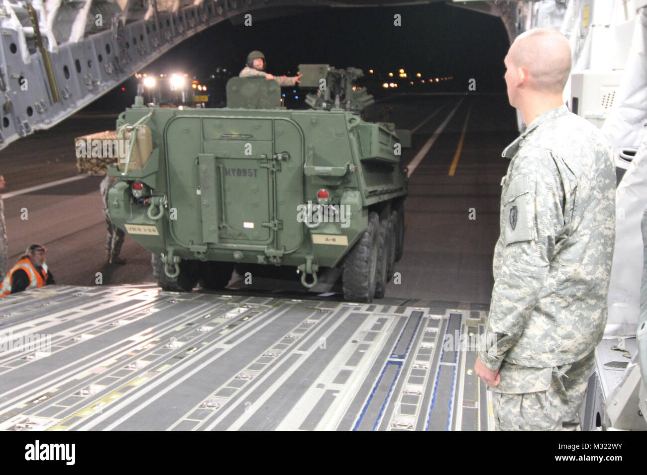 Strykers are loaded into aircraft at Fort Wainwright, Alaska’s Ladd ...
