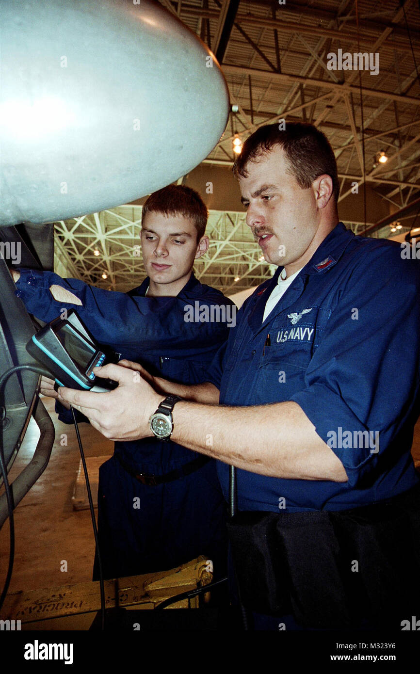 Maintainers at VR-56 use the video probe XL on the Pratt Whitney JT8D ...