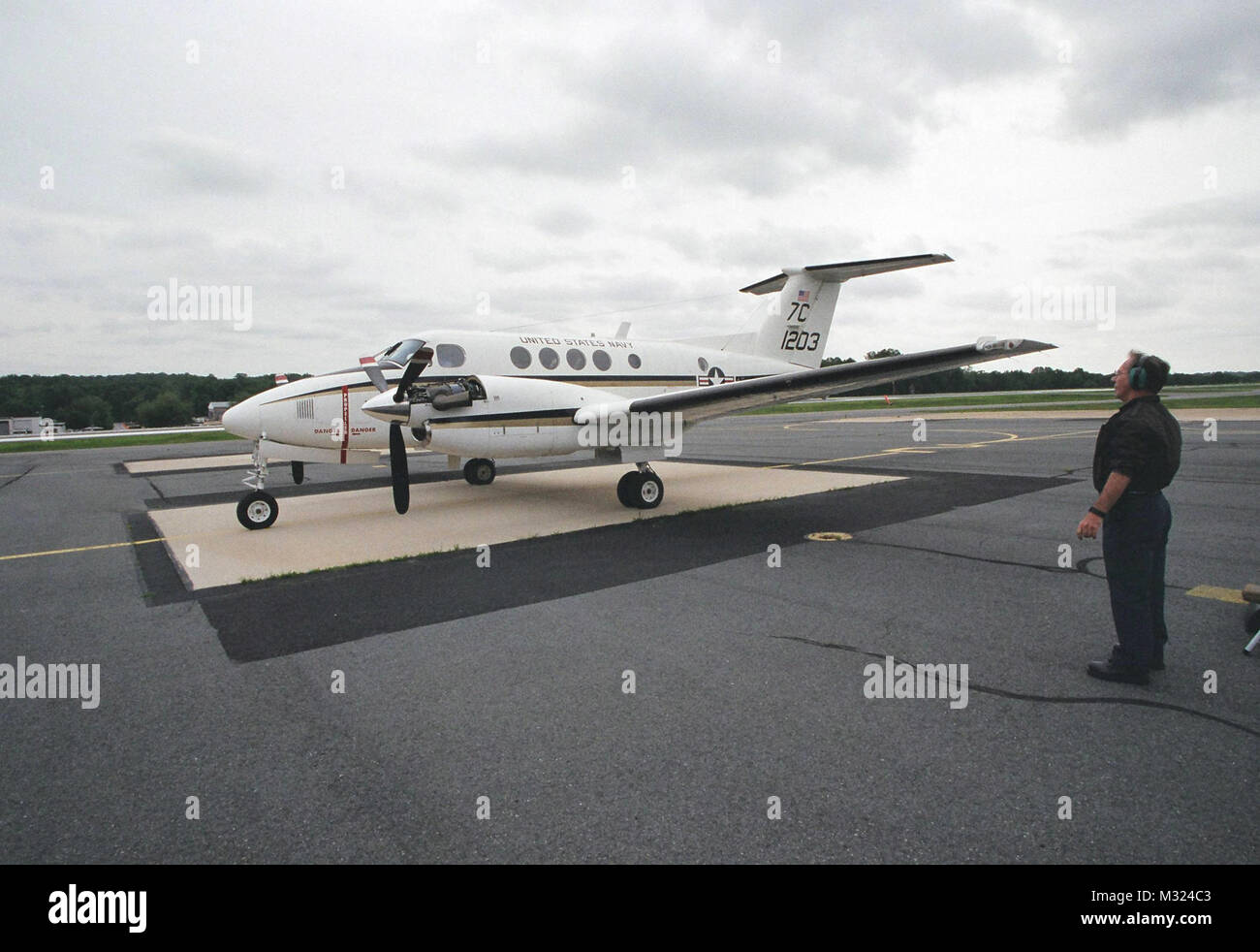 Lt. John Alcorn and Marine Major Jack "Sparky" Landreth pilot the c12b ...