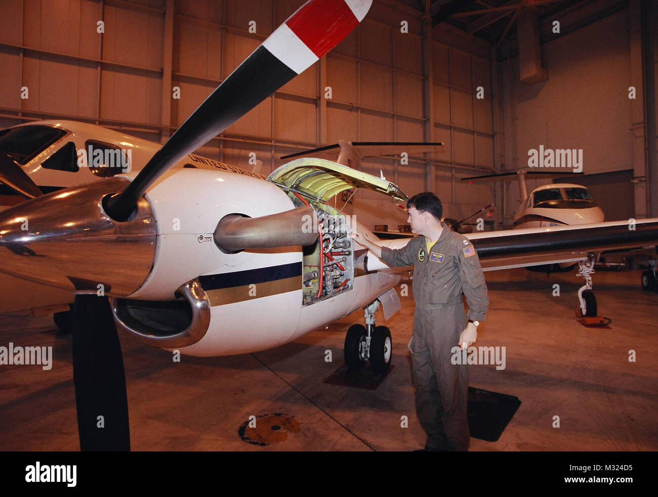Lt. John Alcorn and Marine Major Jack "Sparky" Landreth pilot the c12b ...