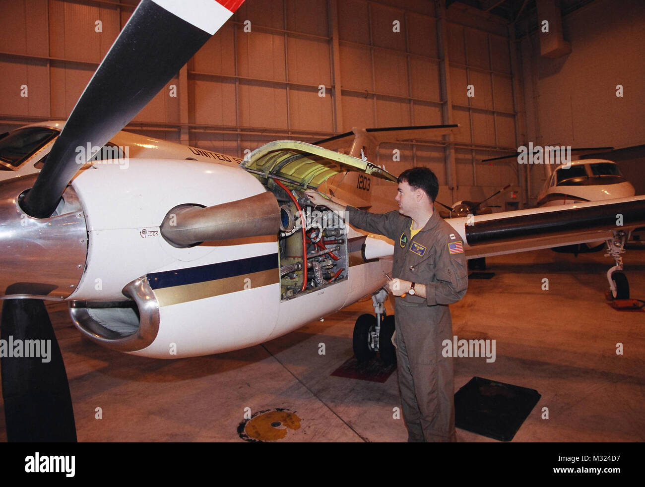 Lt. John Alcorn and Marine Major Jack "Sparky" Landreth pilot the c12b ...