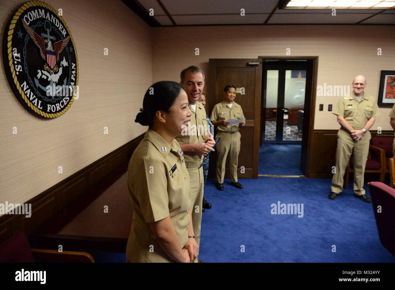 Lt. Cynthia Duke receives the Navy and Marine Corps commendation award ...