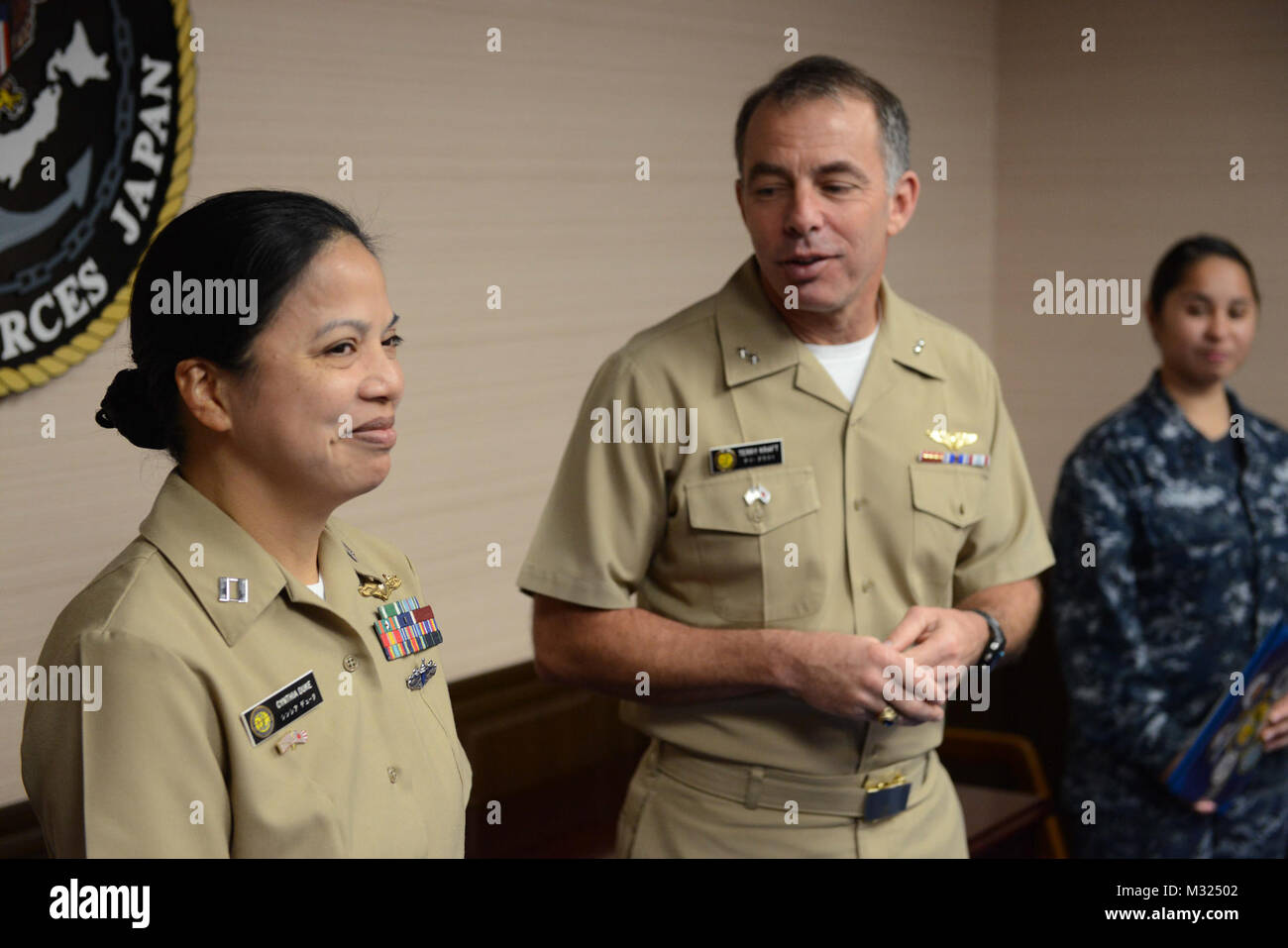 Lt. Cynthia Duke receives the Navy and Marine Corps commendation award ...