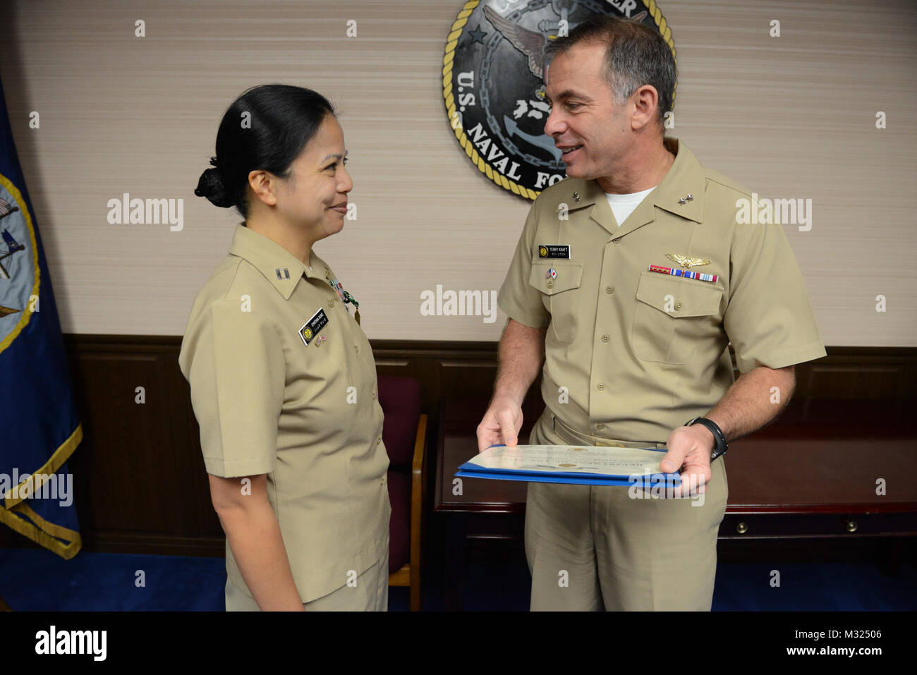 Lt. Cynthia Duke receives the Navy and Marine Corps commendation award ...