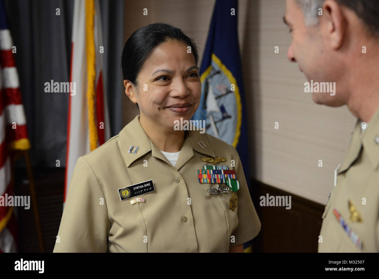 Lt. Cynthia Duke receives the Navy and Marine Corps commendation award ...