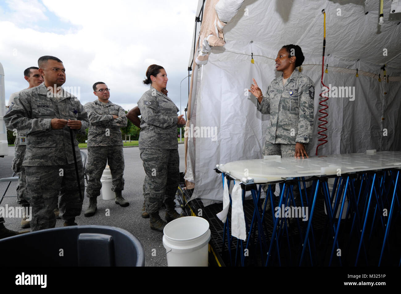 Explains to the 18th Medical Group Airmen the purpose of a ...