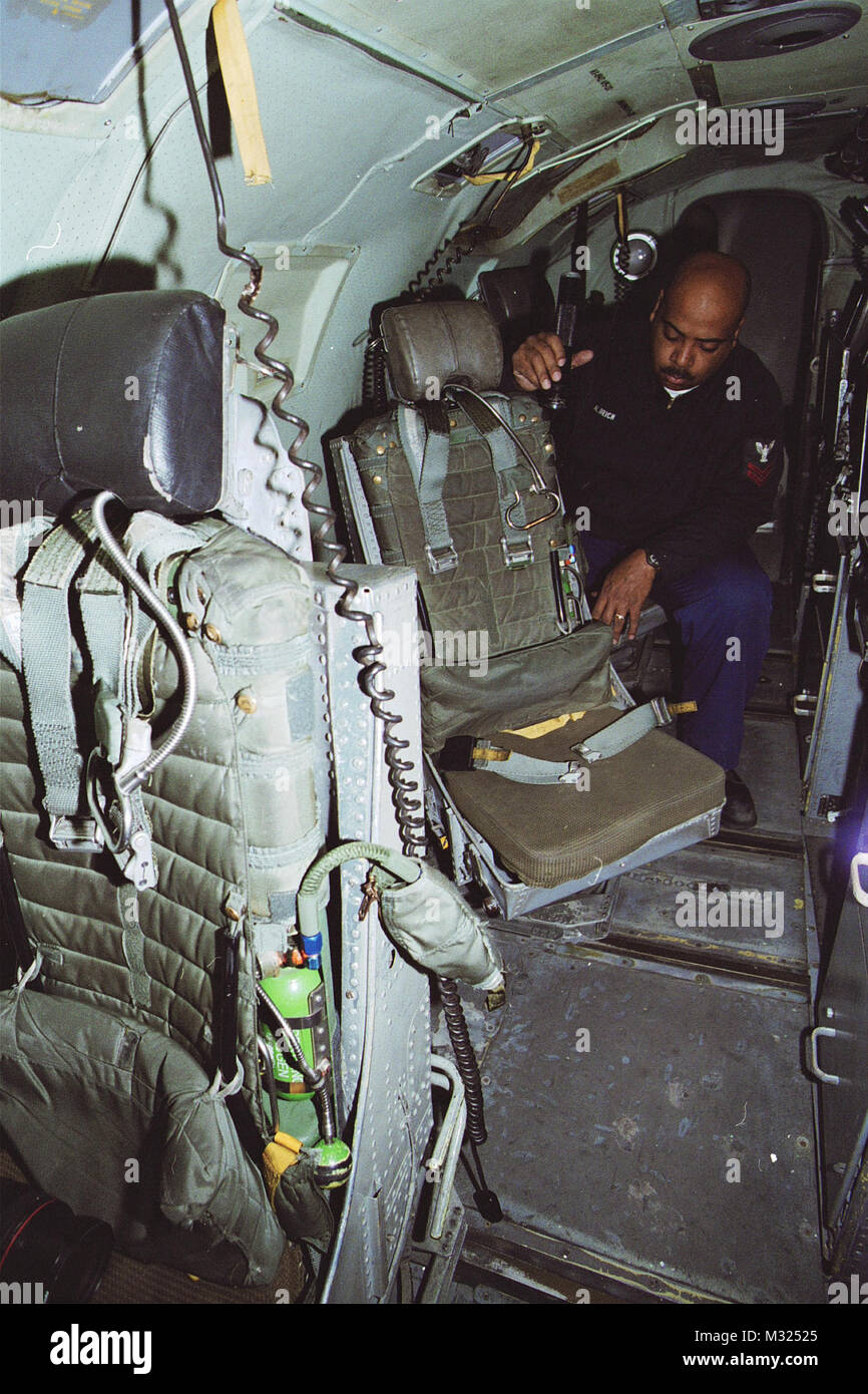 vaw 124 pr2 (aw) eric aldrich inspects the skk-9 survival kit and the a ...