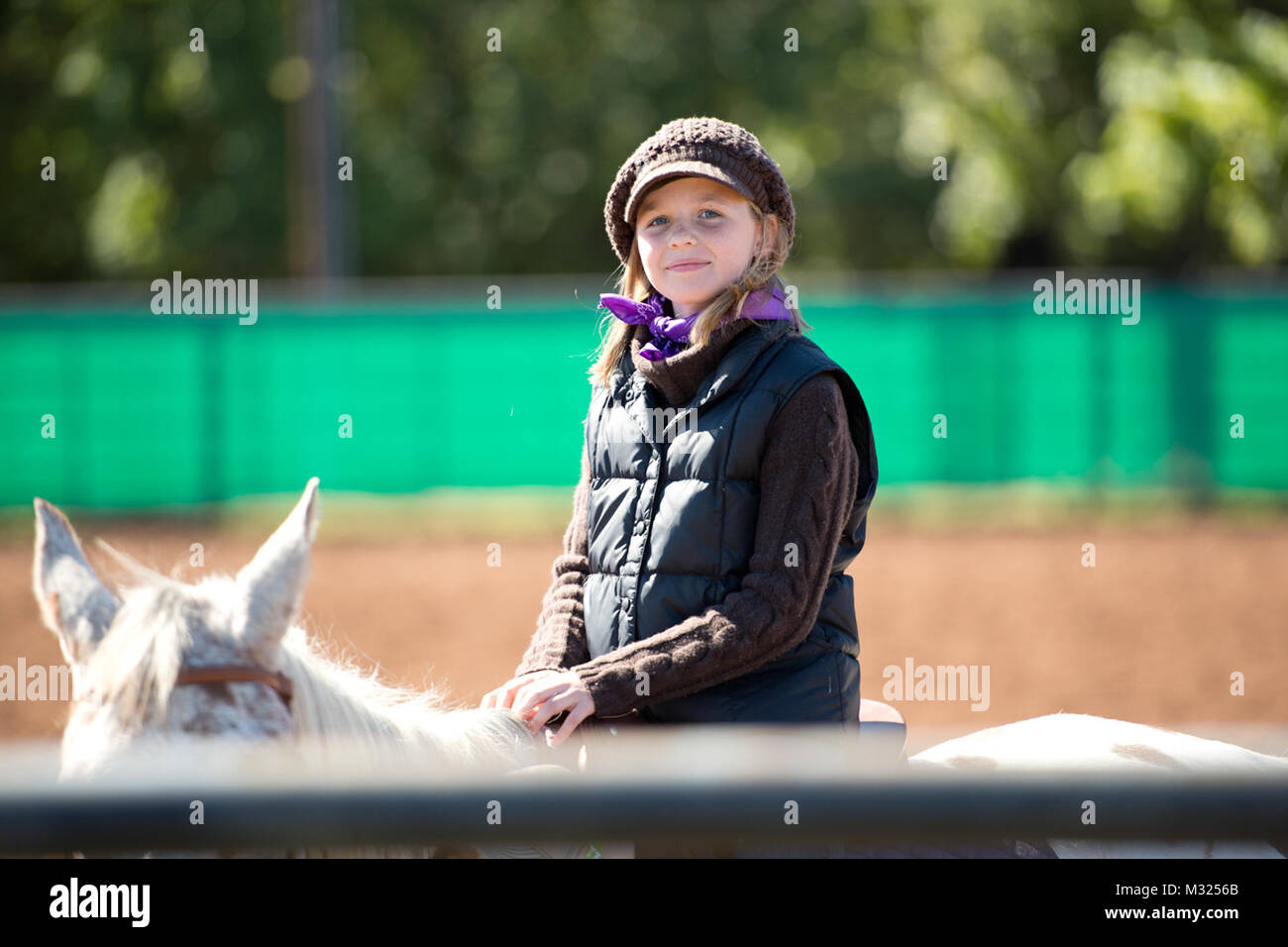 Harper Burgy from Tulsa, Okla., rides around the arena at Covey Creek ...