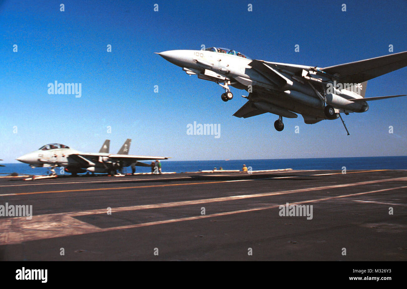001021-N-7917K-002 ABOARD USS GEORGE WASHINGTON (Oct. 21, 2000) -- An F-14B "Tomcat" from the ...