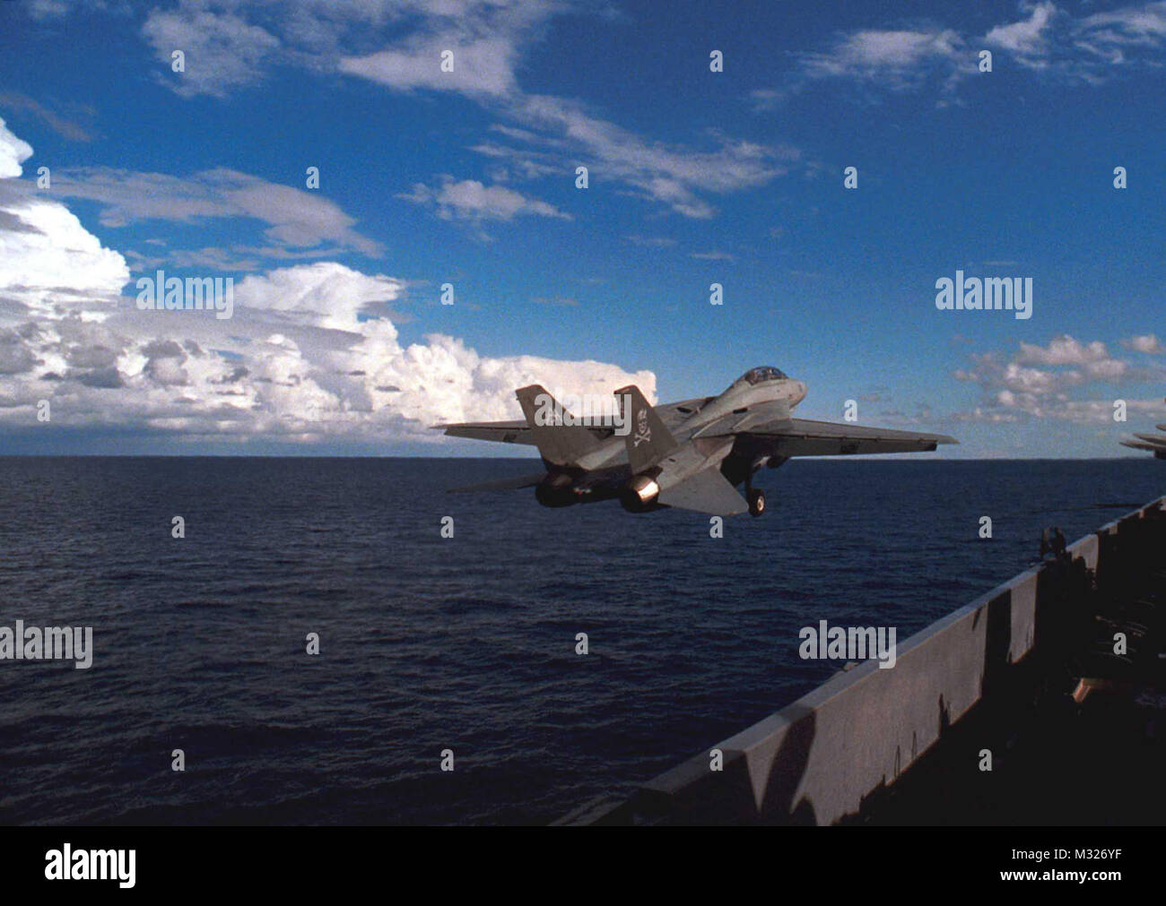 001013-N-8745S-002 Aboard USS GEORGE WASHINGTON (Oct.13, 2000)- An F-14B "Tomcat" assigned to ...