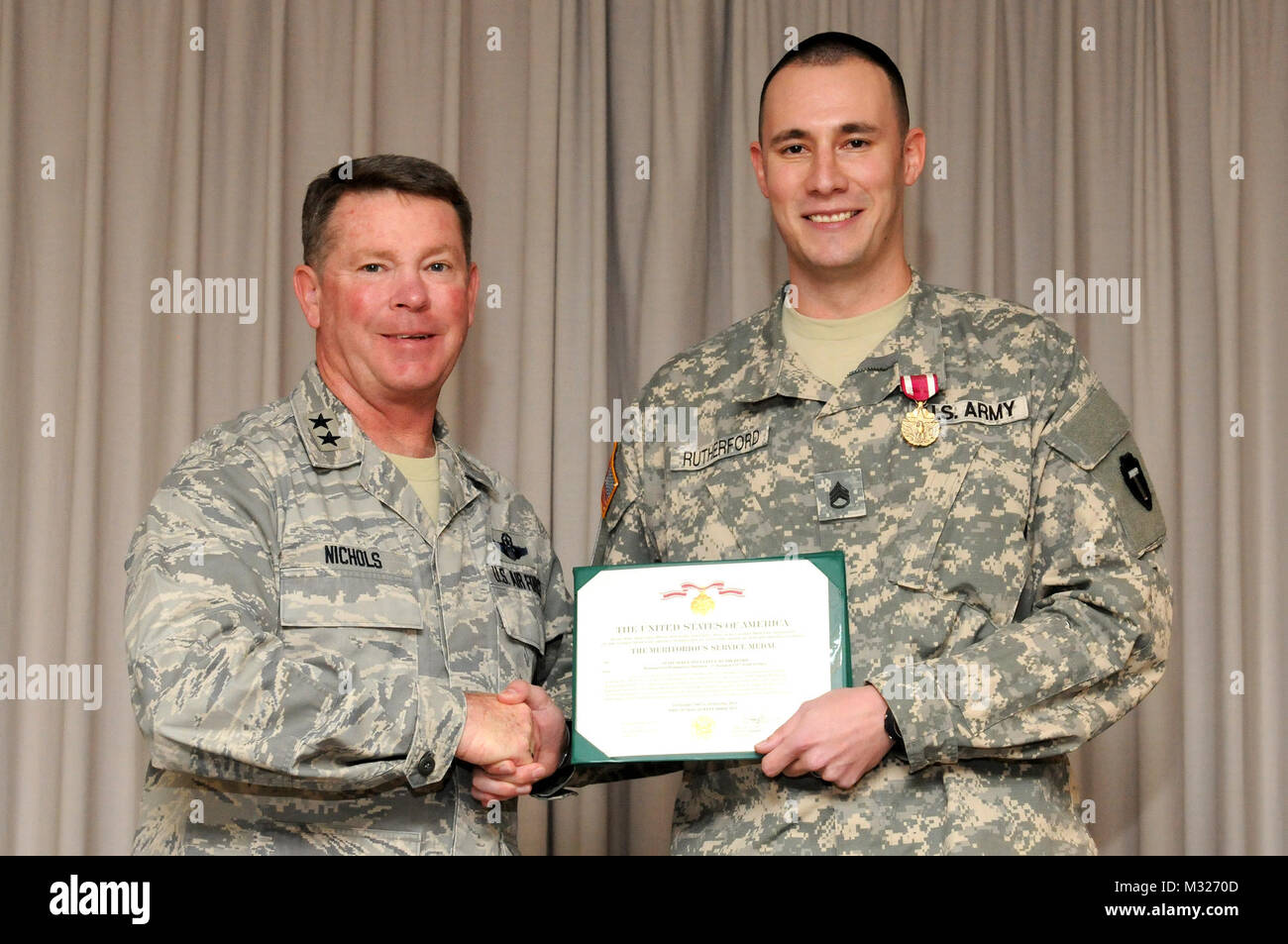 Maj. Gen. John F. Nichols, The Adjutant General of Texas, left ...