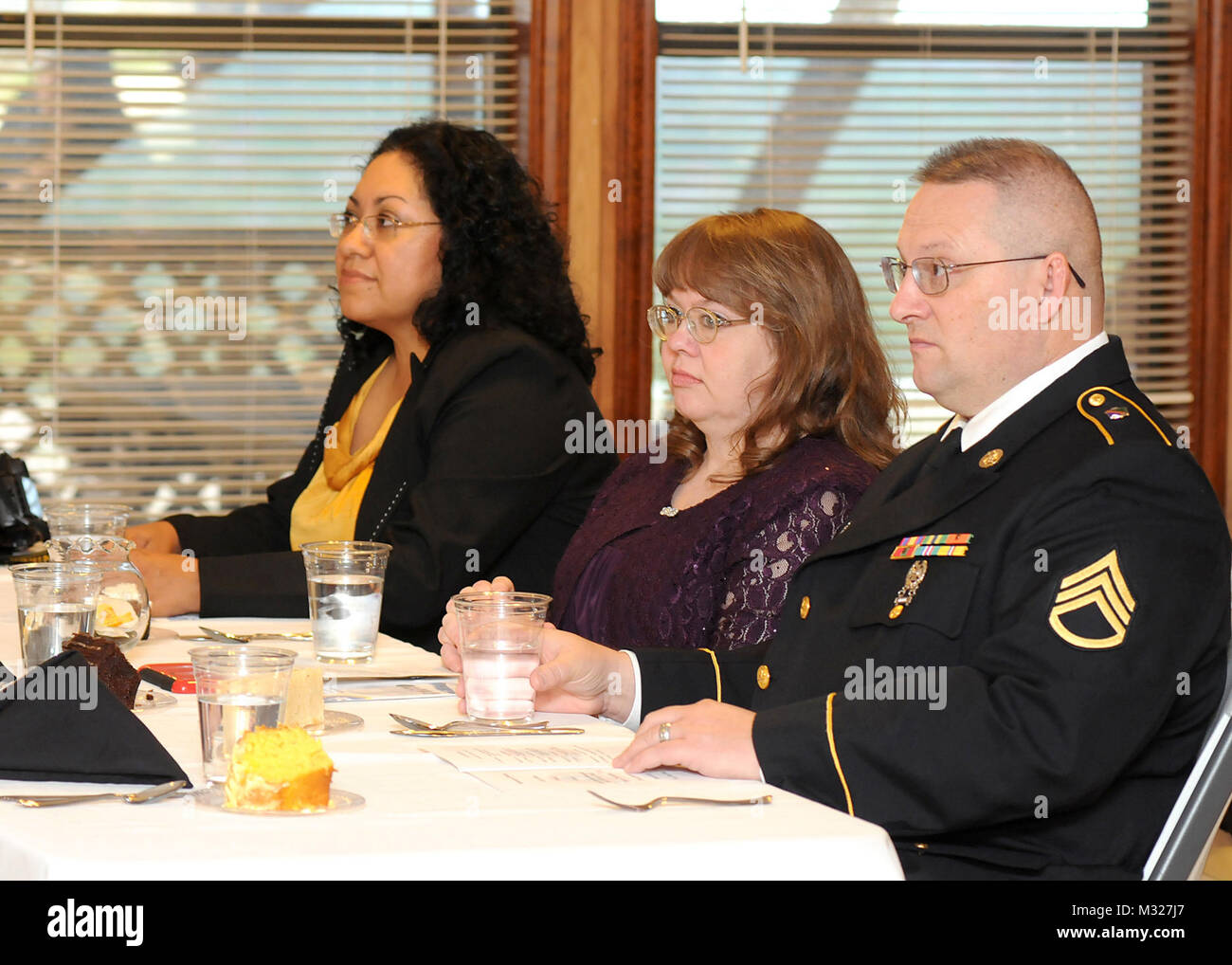 Capt. Esperanza Meza, Texas State Guard, left, Mrs. Teresa Gately ...