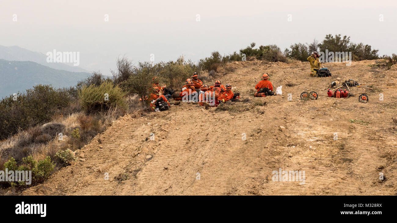 California Department of Corrections inmate fire fighters rest after ...