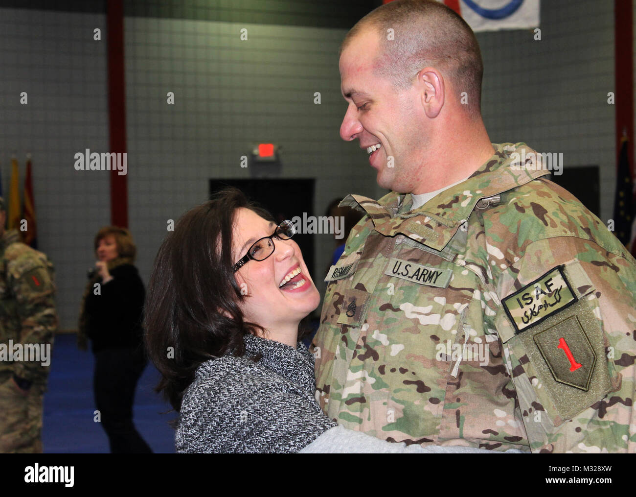Tiffany Rismiller surprises her husband, Staff Sgt. Ian Rismiller ...