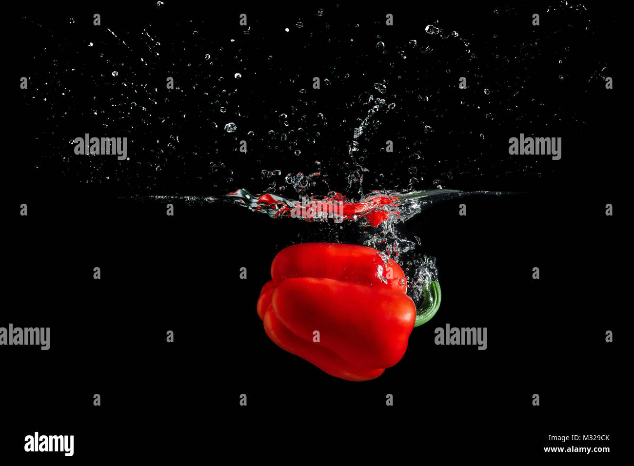 bell pepper in water with splash Stock Photo - Alamy