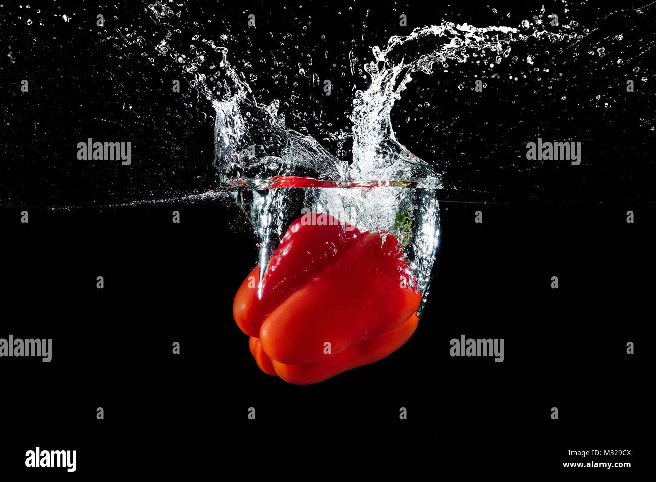 bell pepper in water with splash Stock Photo - Alamy