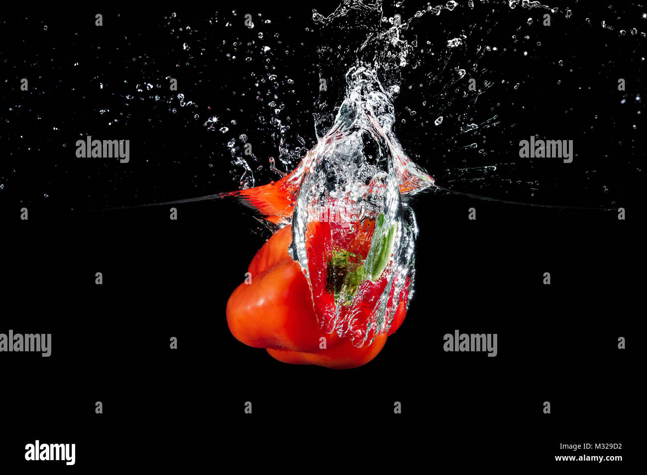 bell pepper in water with splash Stock Photo - Alamy