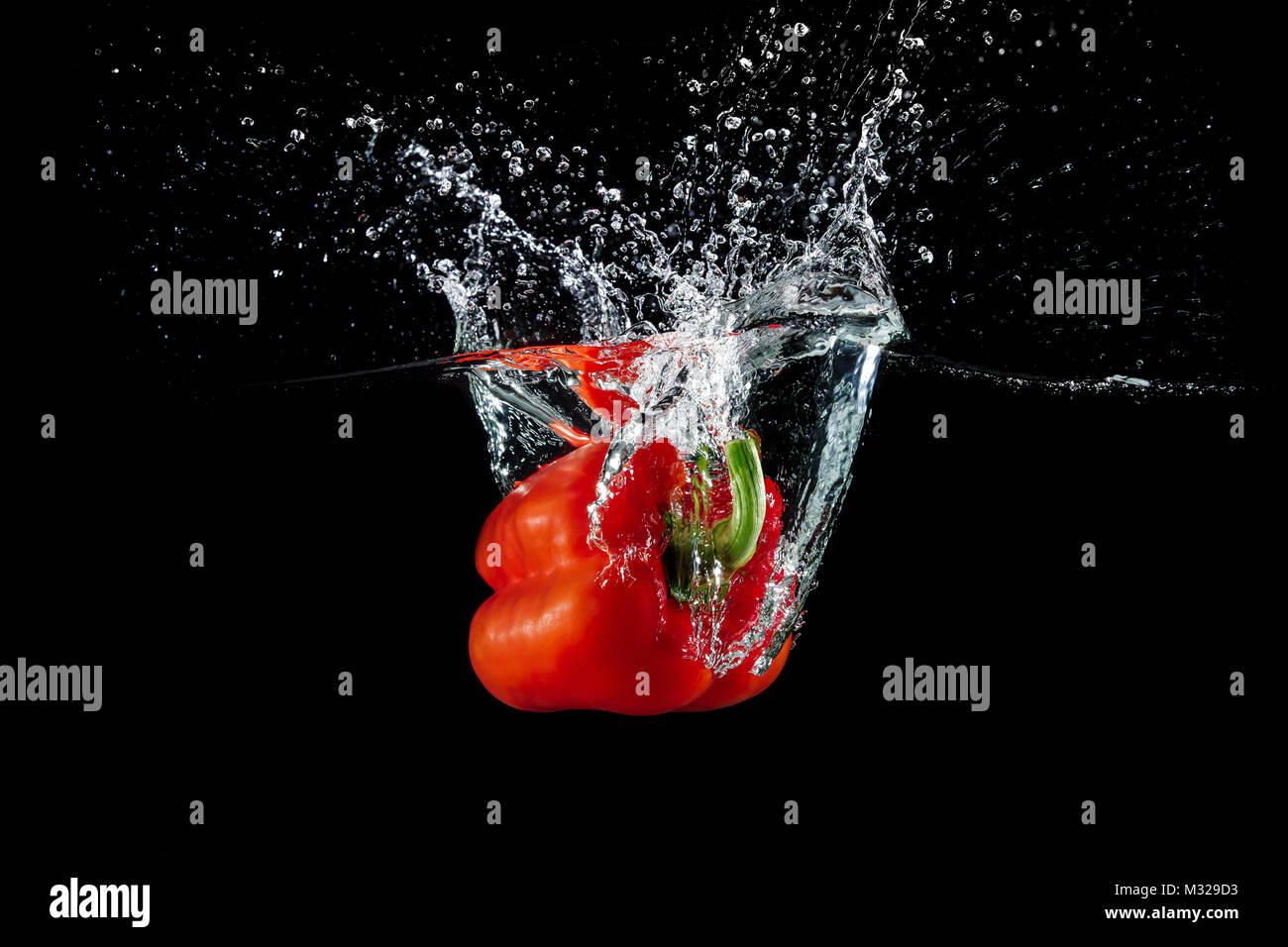 bell pepper in water with splash Stock Photo - Alamy
