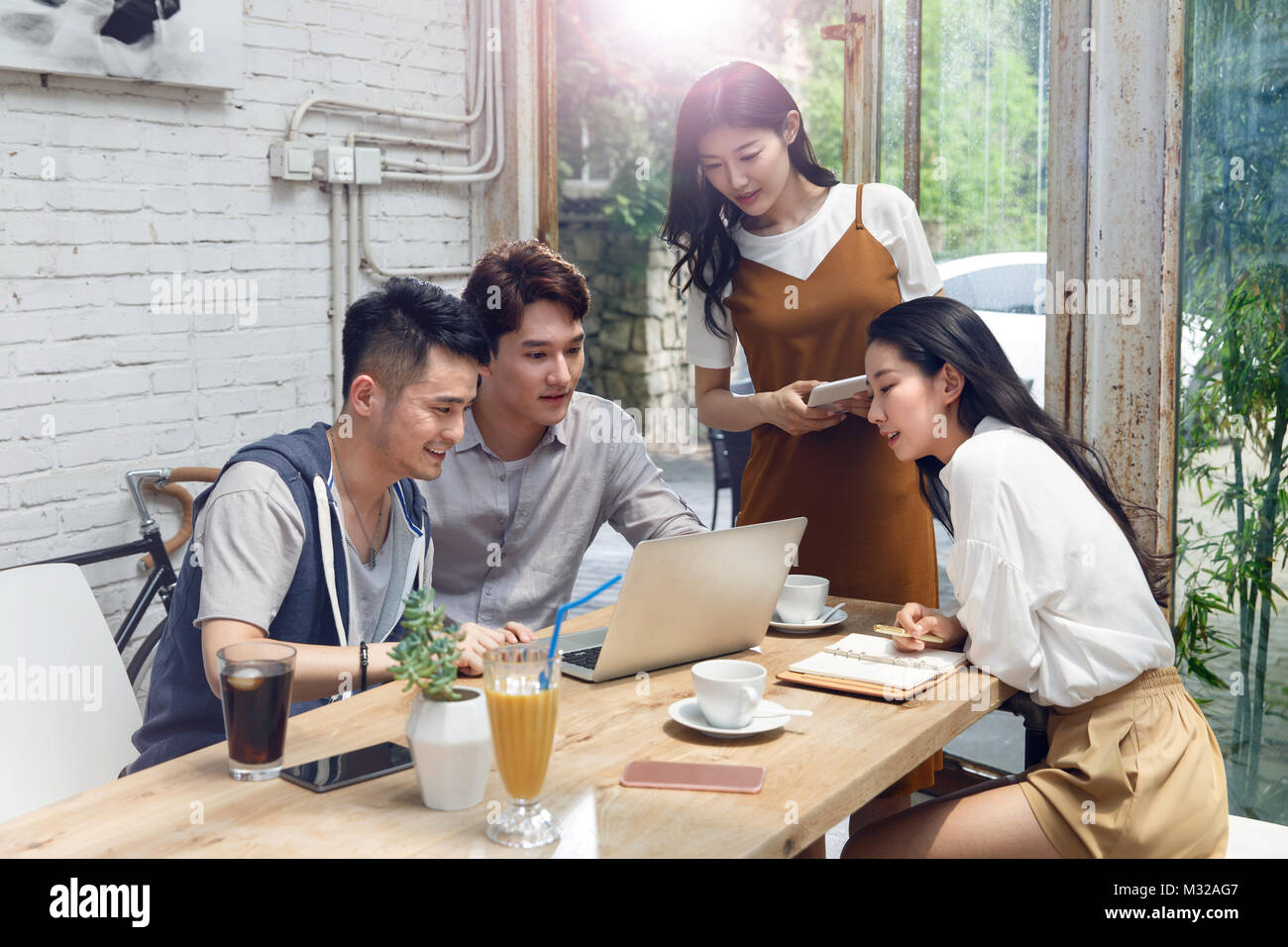 Young people work in a studio Stock Photo - Alamy