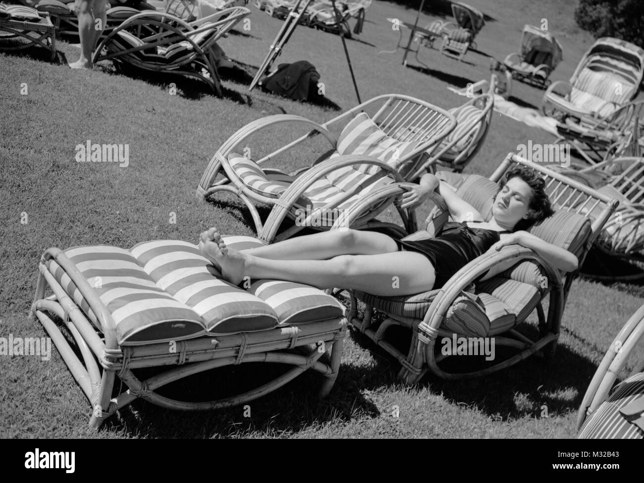 Vintage woman sunbathing Black and White Stock Photos & Images - Alamy