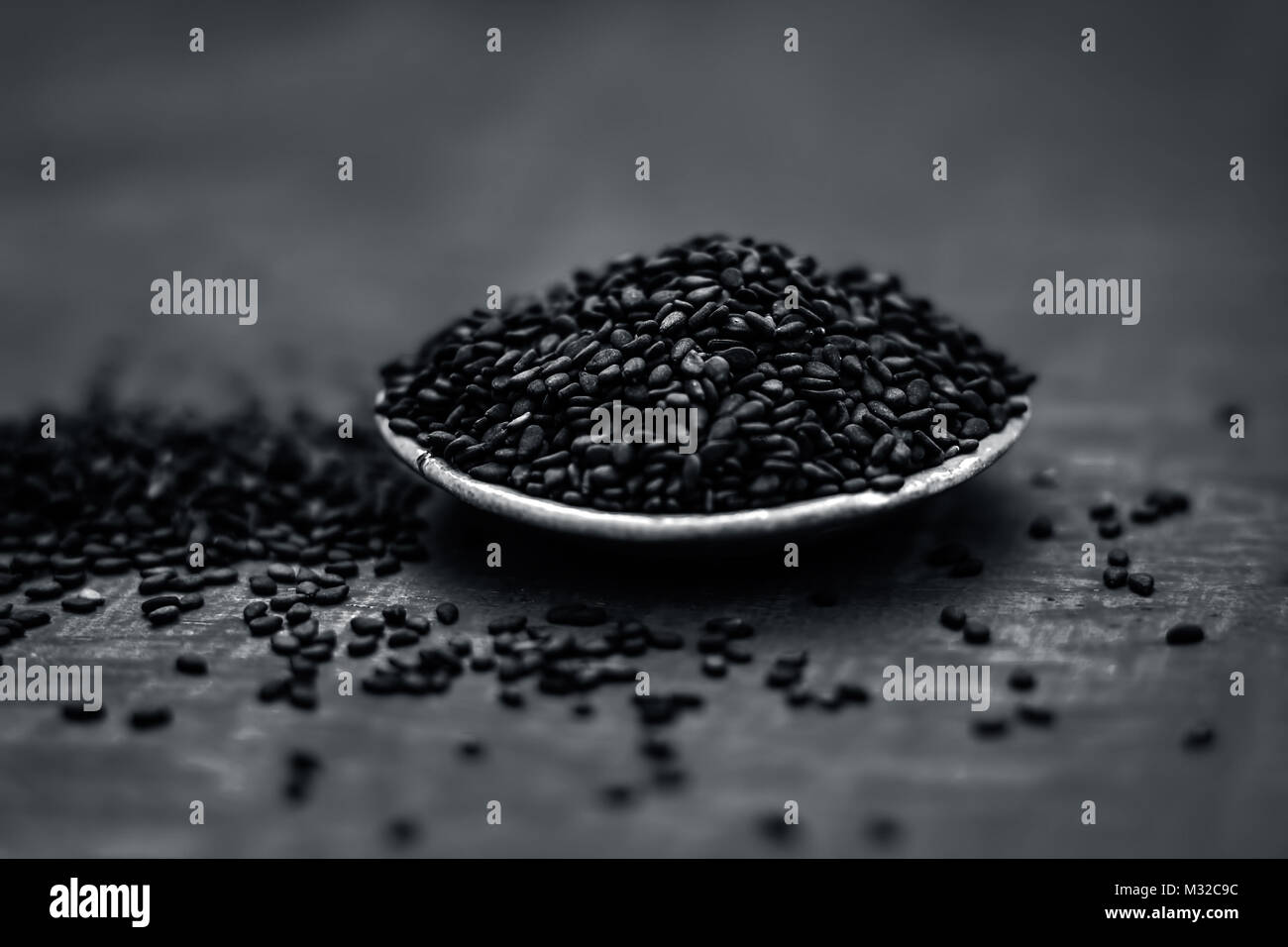 Close up of black sesame seed,Sesamum indicum in a small plate on a ...