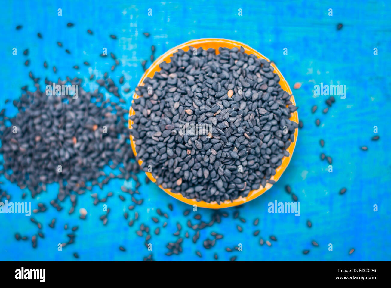 Close up of black sesame seed,Sesamum indicum in a small plate on a ...