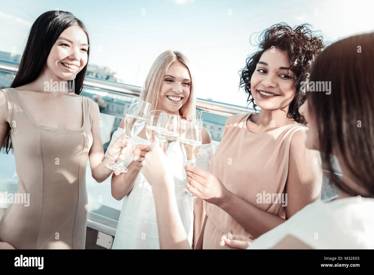 Nice happy women looking at each other Stock Photo - Alamy