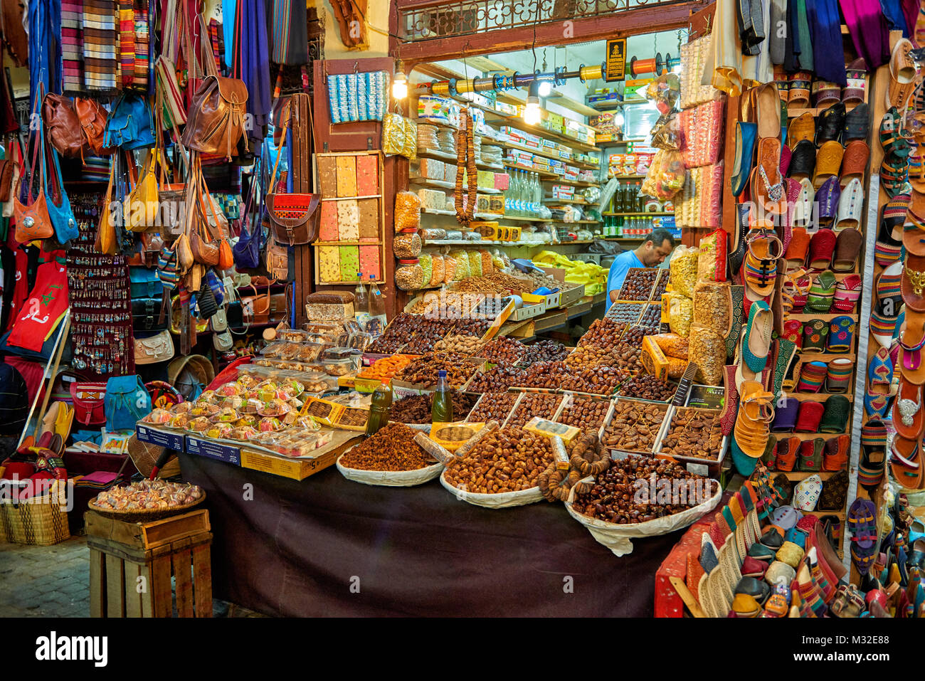 market stalls with food in the narrow alleys in old town (medina) of ...