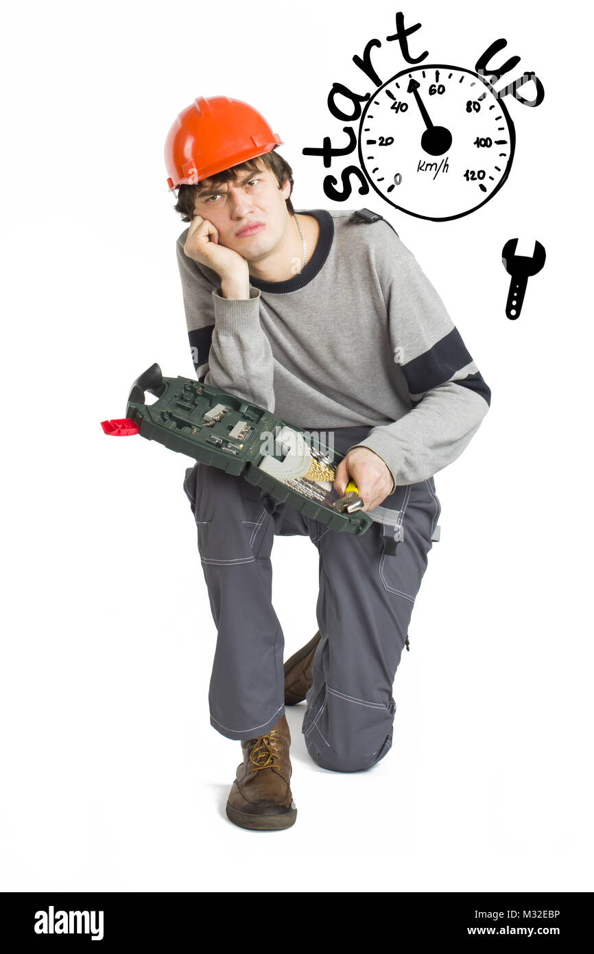 Business concept of self-made man. Young laborer man in orange helmet ...