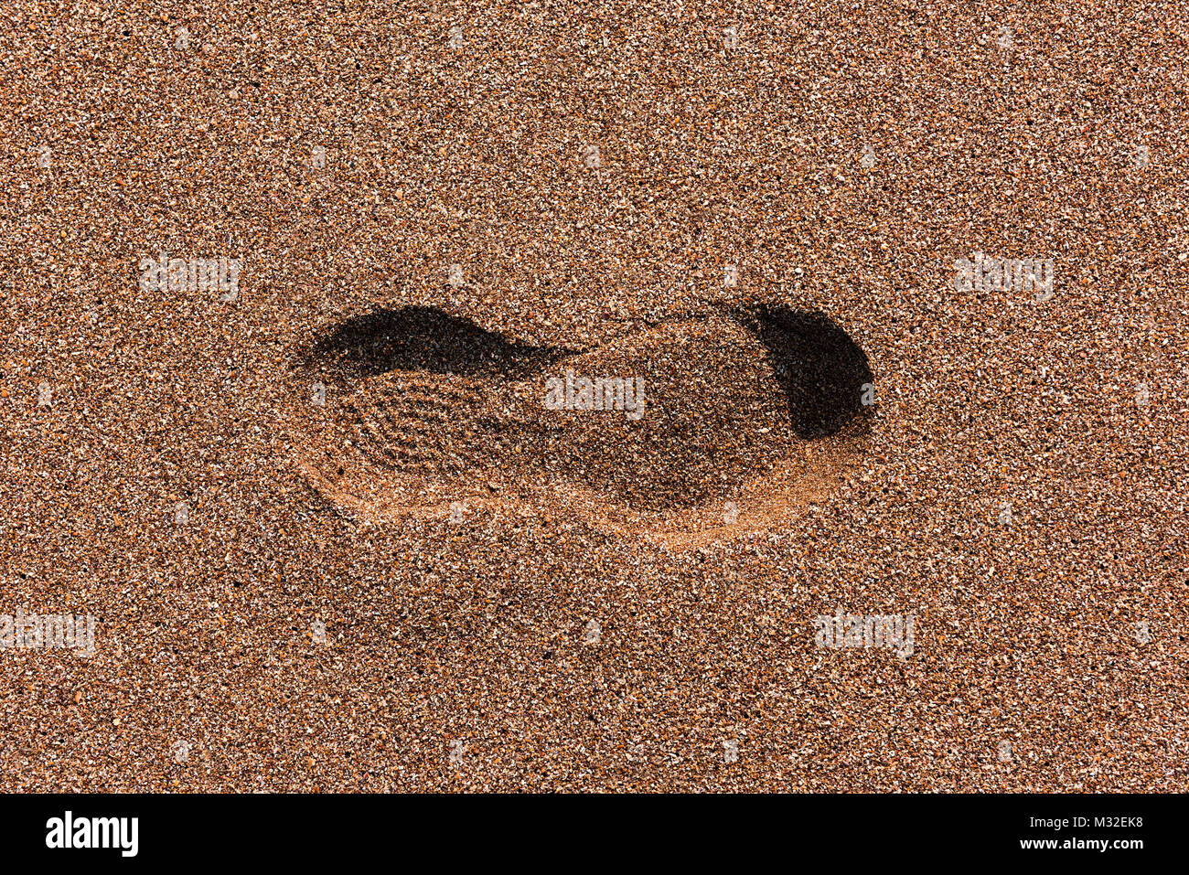 Man trace on the sand Stock Photo - Alamy