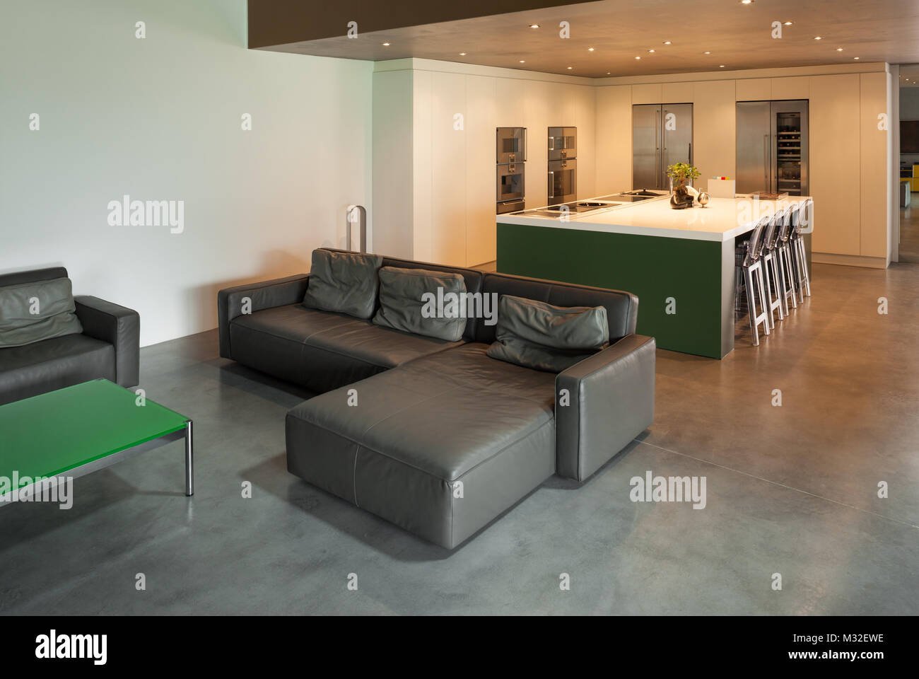 Modern living room, interior, house in cement Stock Photo - Alamy