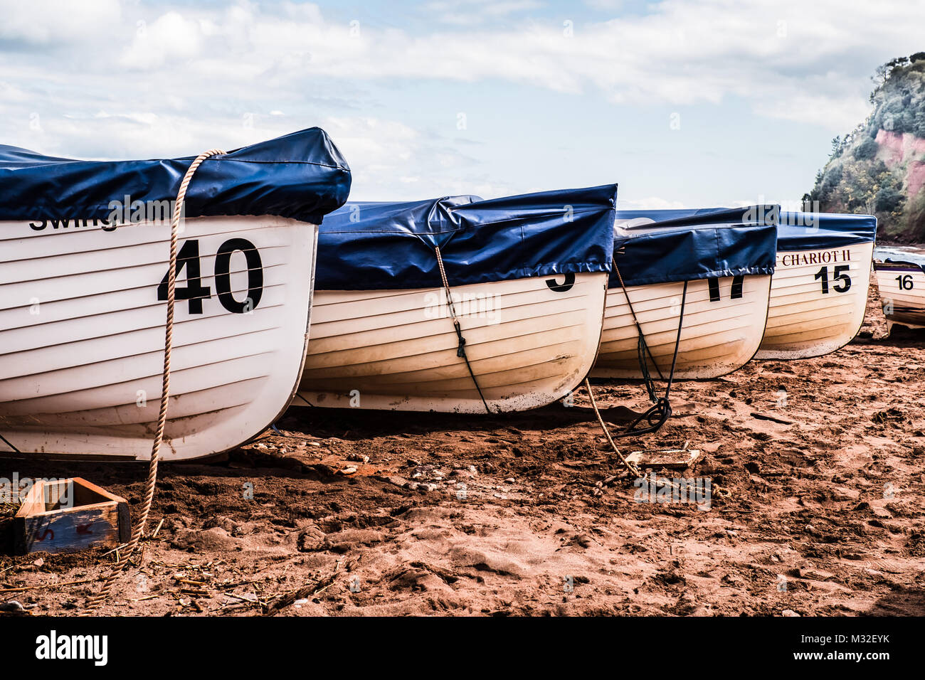 Colourful rowing boats on beach hi-res stock photography and images - Alamy