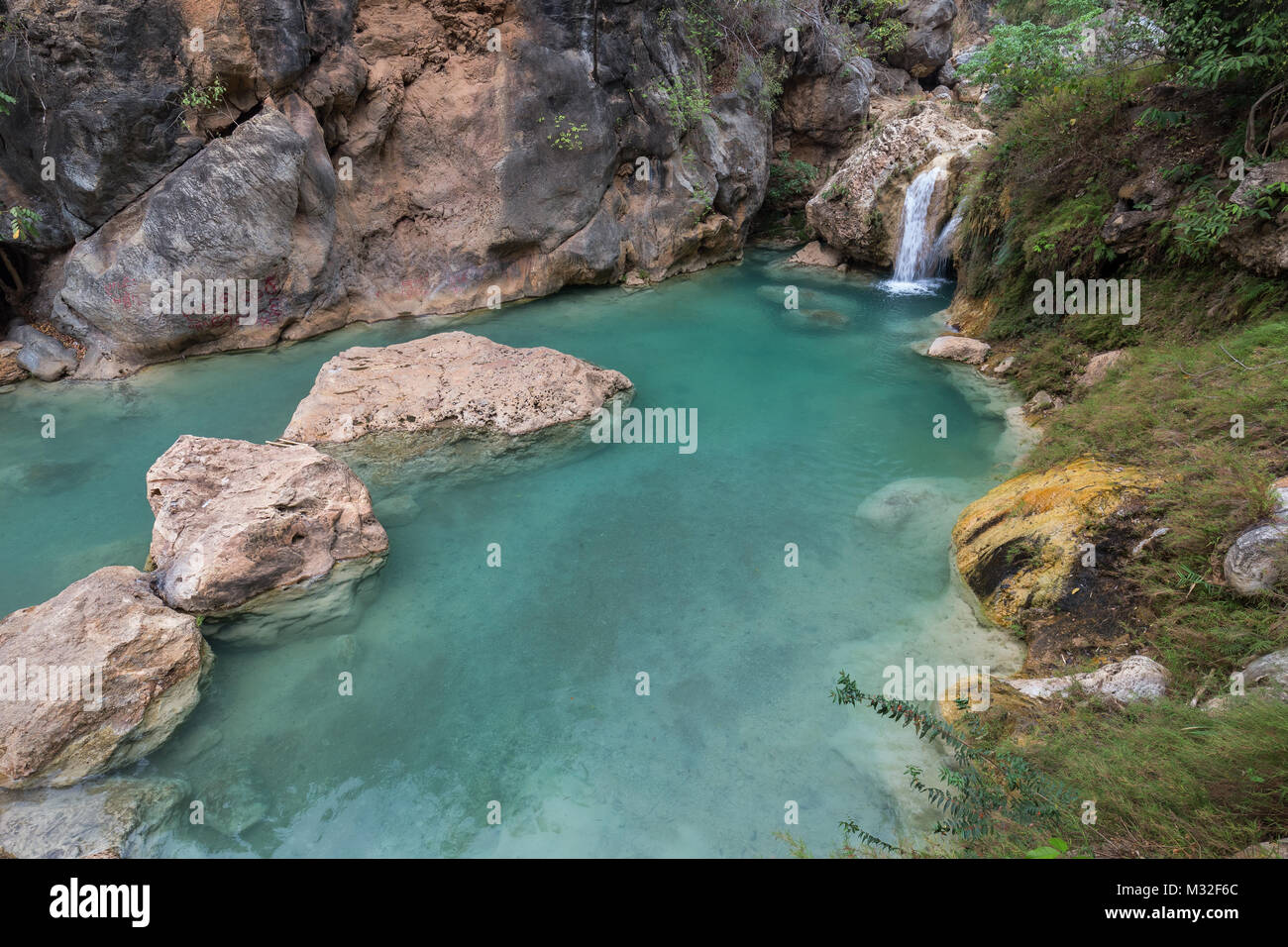 Rocks and pond at the Deed Doat Waterfalls near Mandalay in Myanmar ...