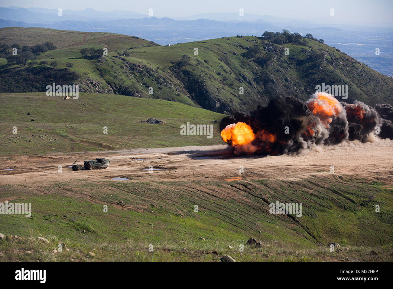 U.S. Marines and Japan Ground Self-Defense Force soldiers detonate a ...