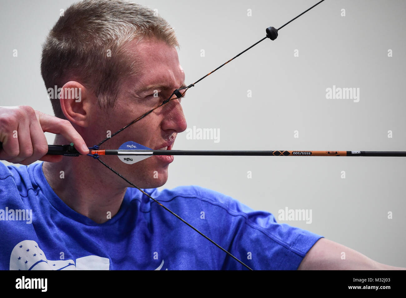 Cal Gentry, Air Force Trials participant, prepares to fire an arrow ...
