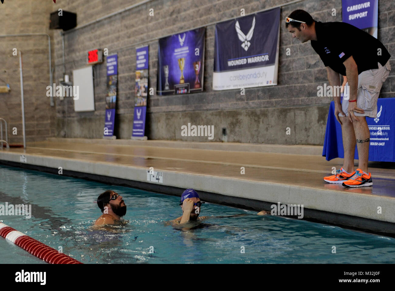 A U.S. Air Force swimming coach gives Air Force Trials competitors ...