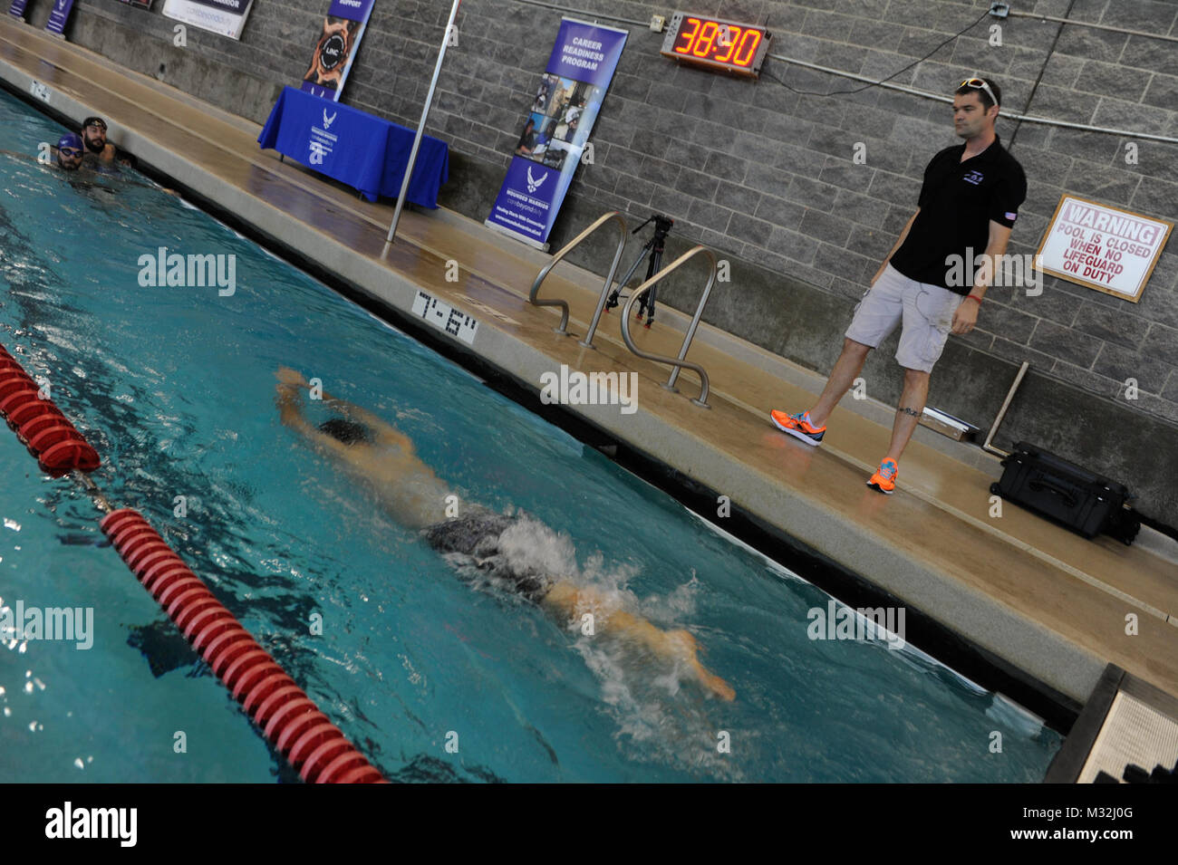 A U.S. Air Force swimming coach gives Air Force Trials competitors ...