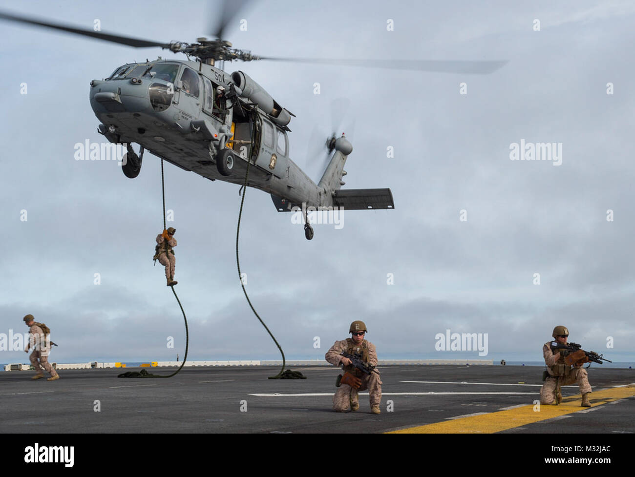US Marines Fast Rope onto the USS Boxer in the Pacific Ocean by #PACOM ...