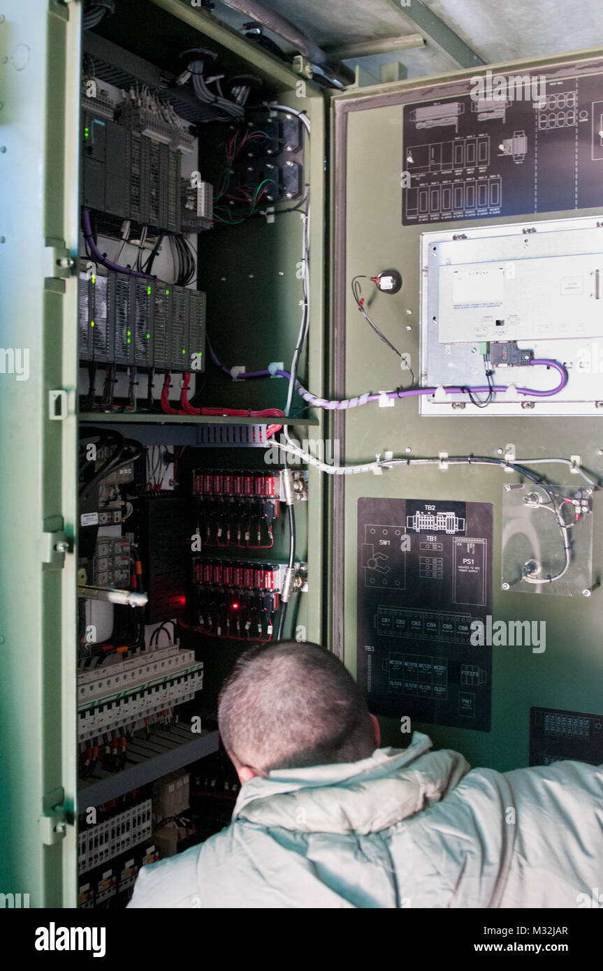 Cpl. Joshua Rich, a laundry specialist with the 1008th Quartermaster ...