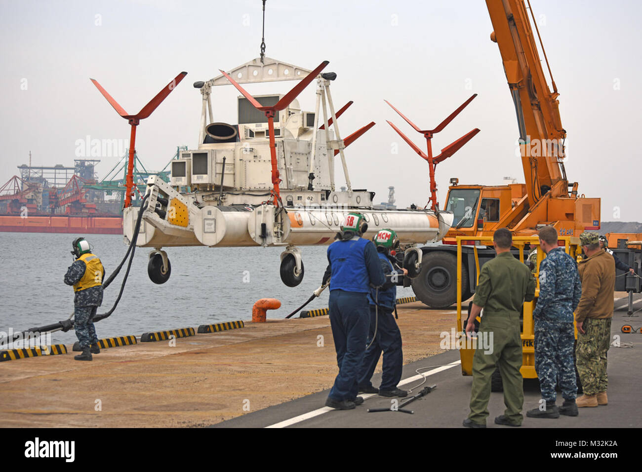 US Sailors Prepare an MK Magnetic Mine Sweeping System for a ...