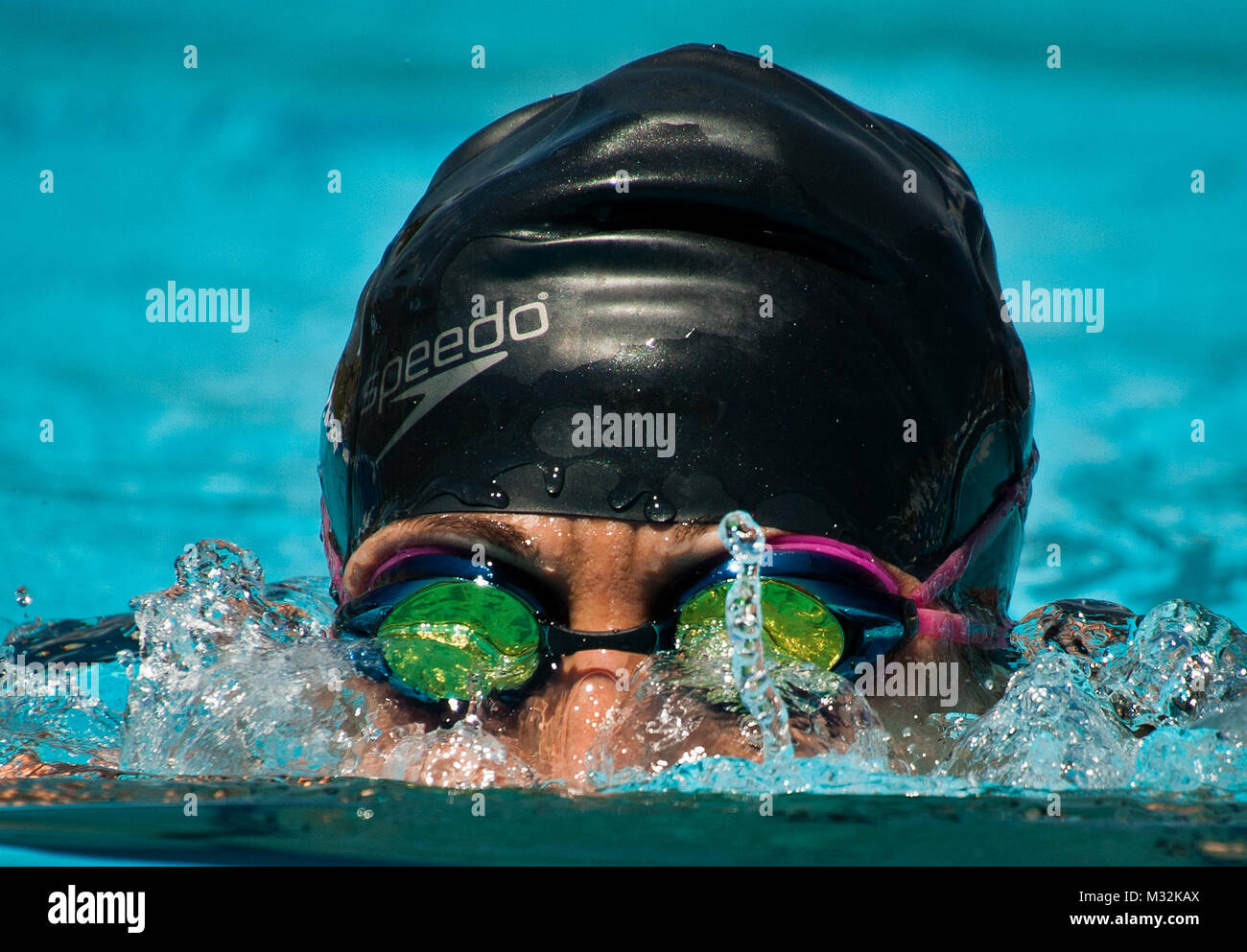 Tonya Perez, a Warrior Games athlete, lifts her head out of the water ...