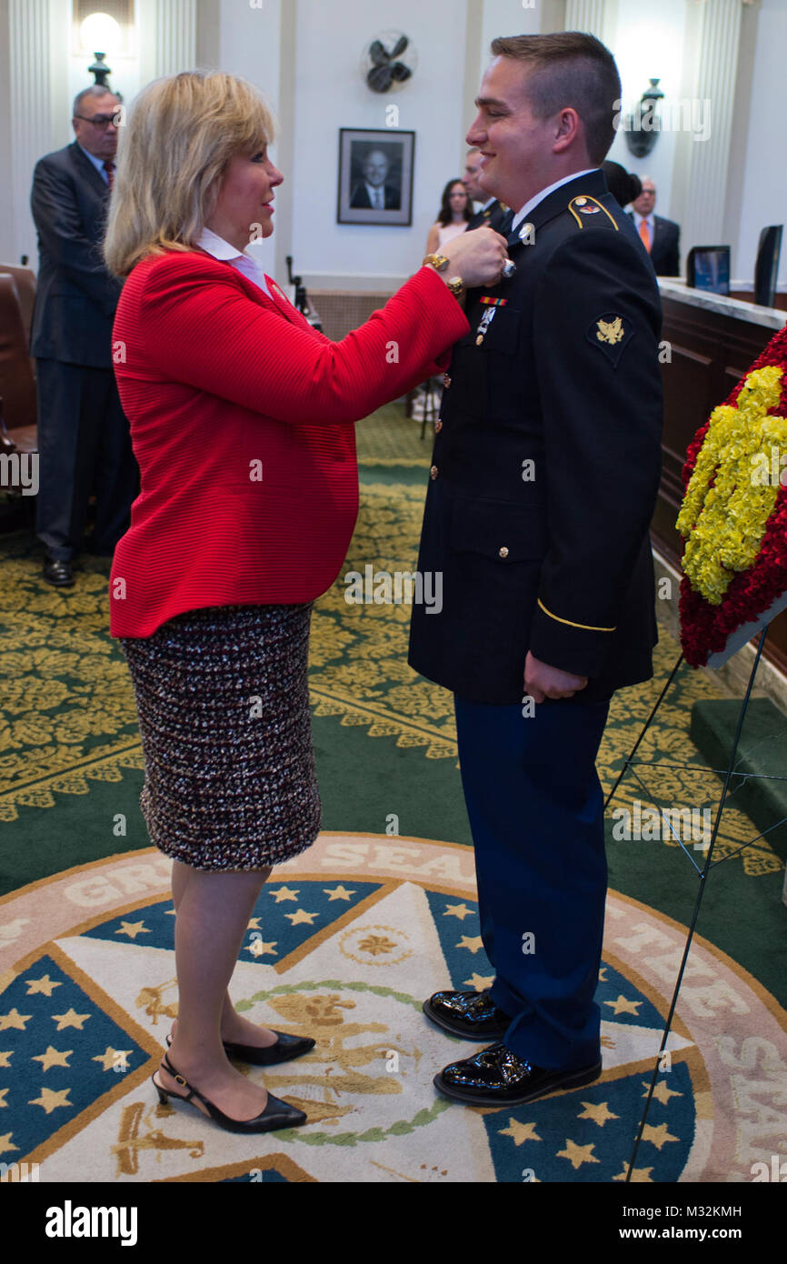 The Honorable Mary Fallin (left), governor of Oklahoma, presents a ...